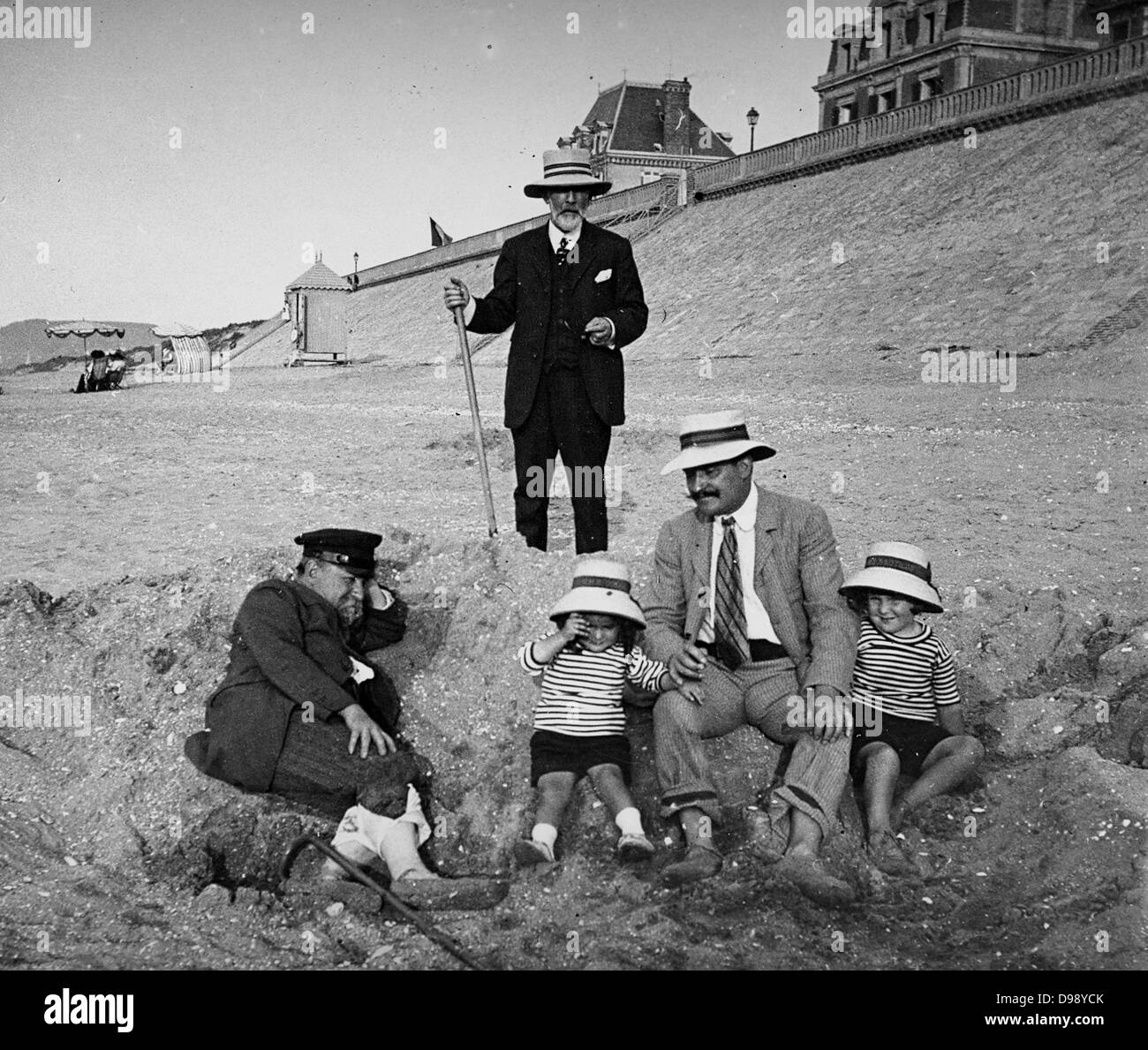 French coastal scene with people on a beach. Circa 1900 Stock Photo - Alamy