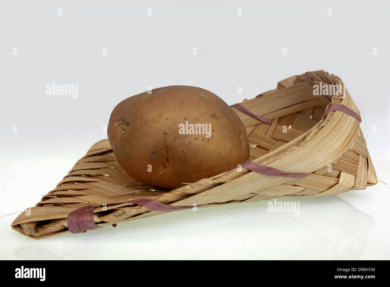 Potato in Winnowing Fan Stock Photo - Alamy