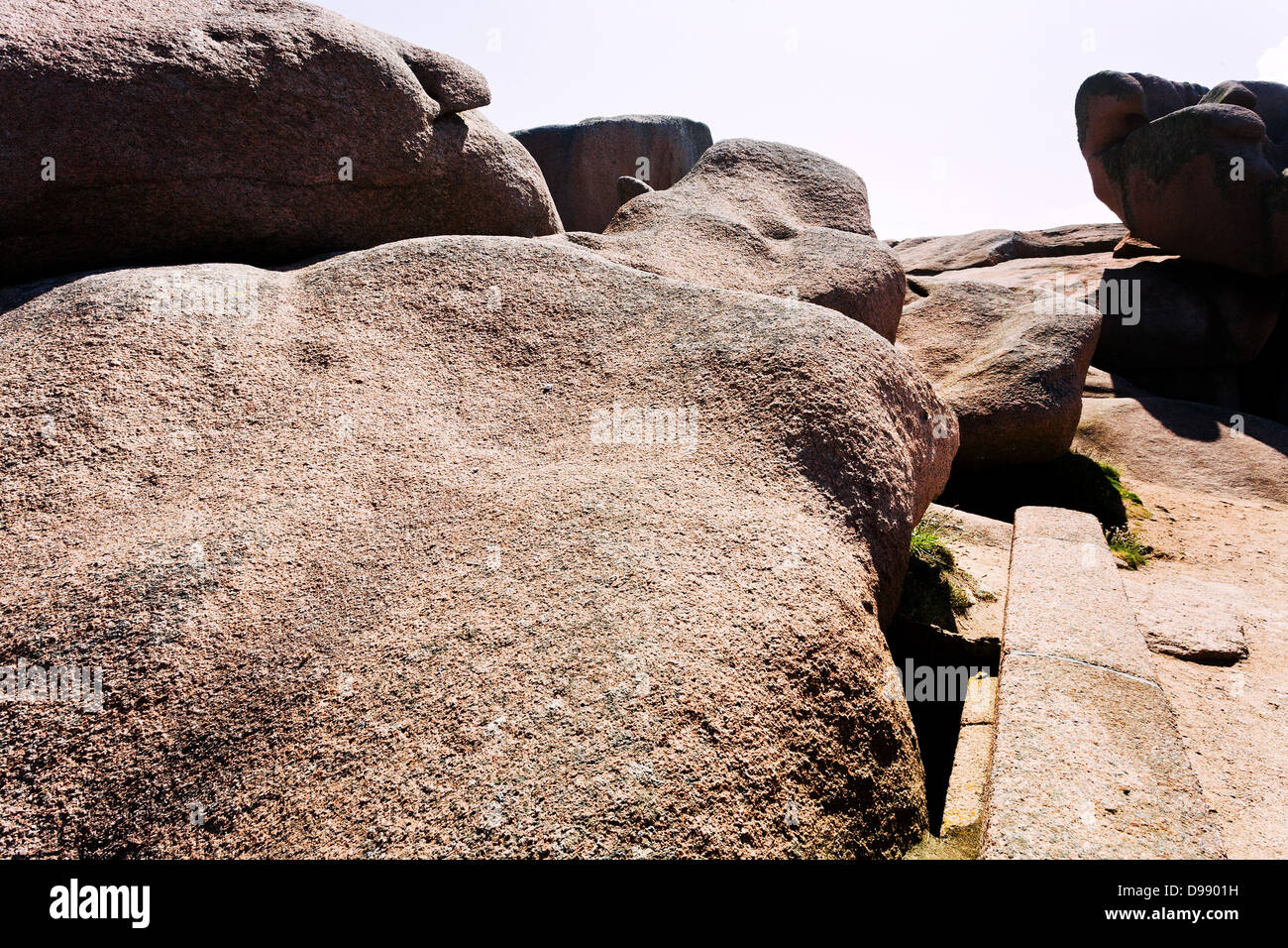 large Pink granite boulders on sea coast in Brittany, France Stock ...