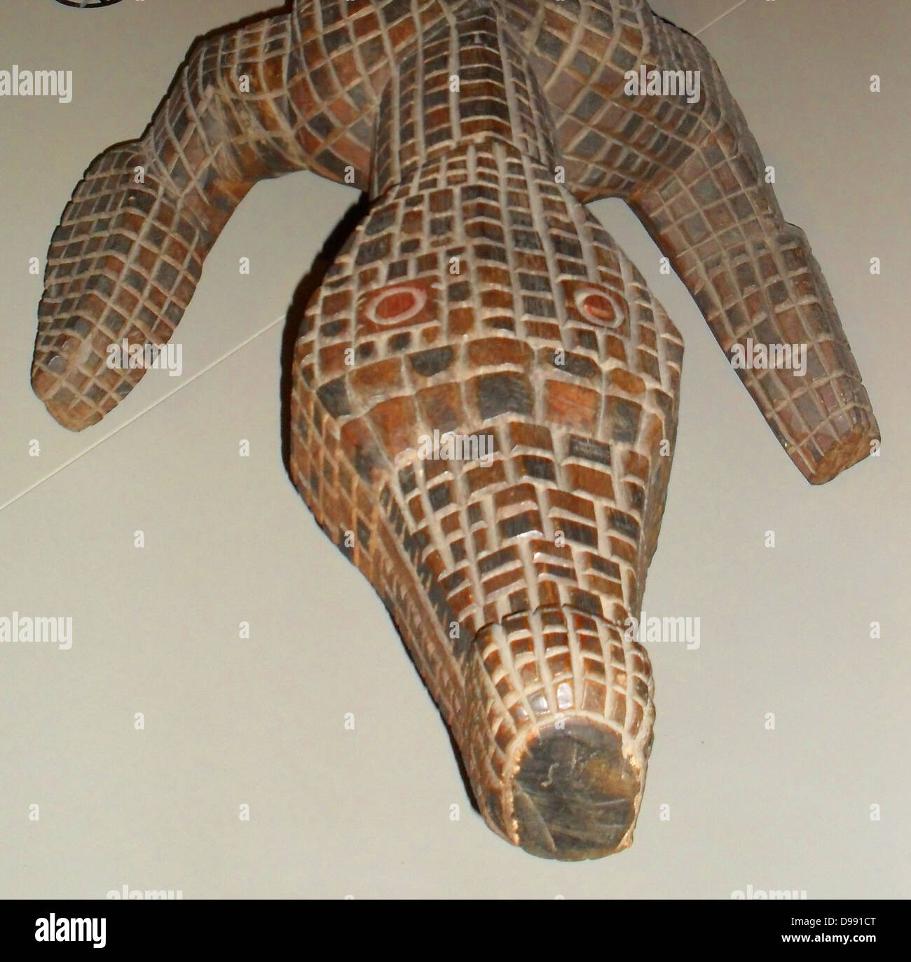 Ritual wooden figure of a crocodile used by fishermen to help bring ...