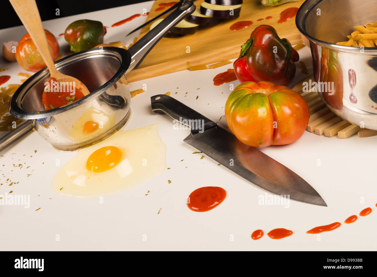 A kitchen table that has become a terrible mess Stock Photo - Alamy