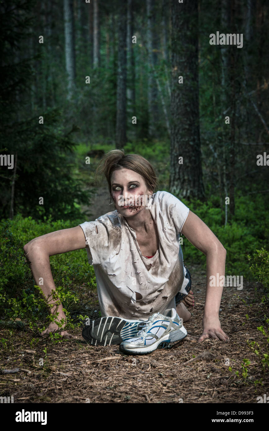 a scary and bloody zombie Stock Photo - Alamy