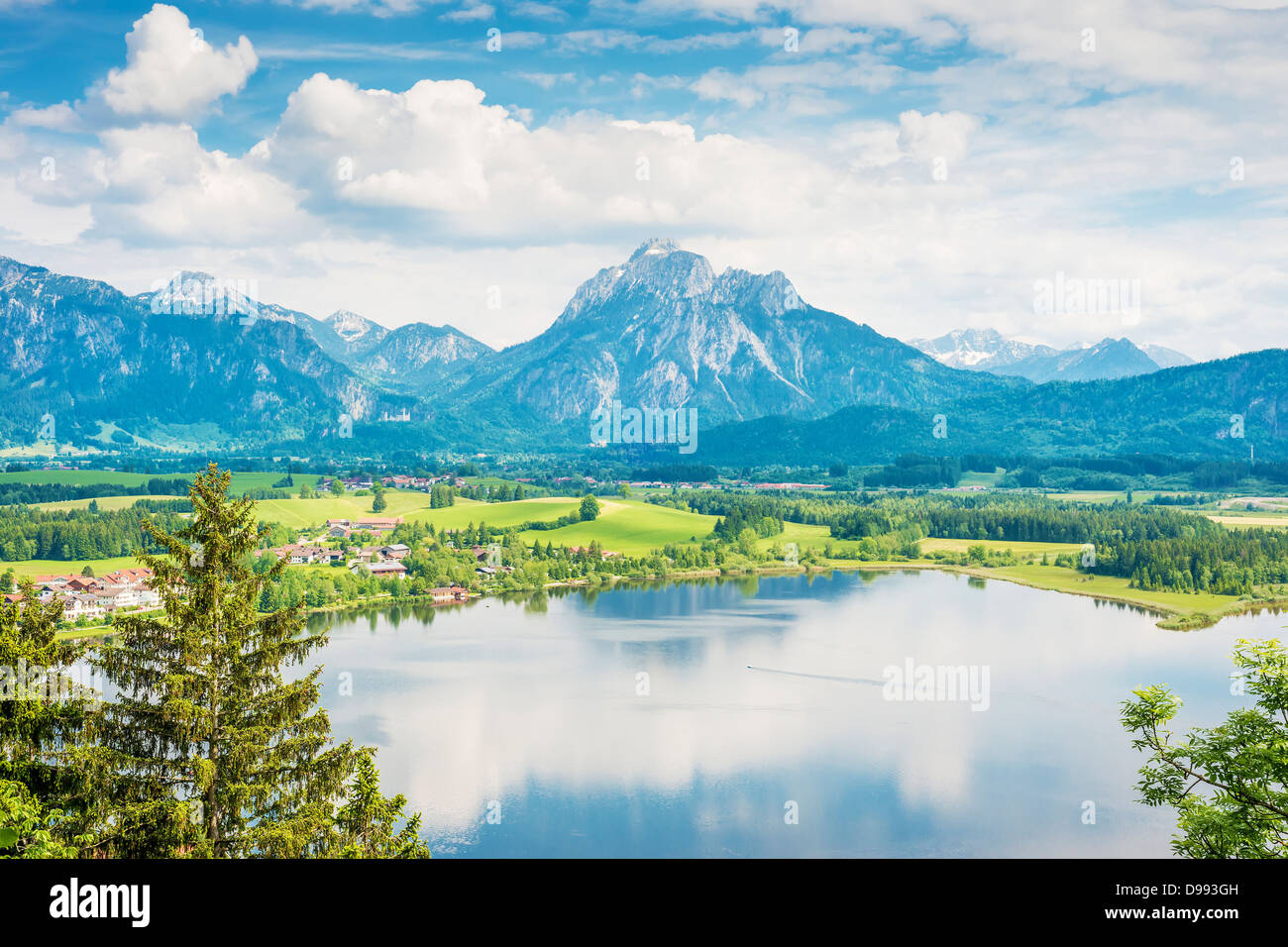 Lake named Hopfensee in Bavaria Germany with alps and blue sky with ...