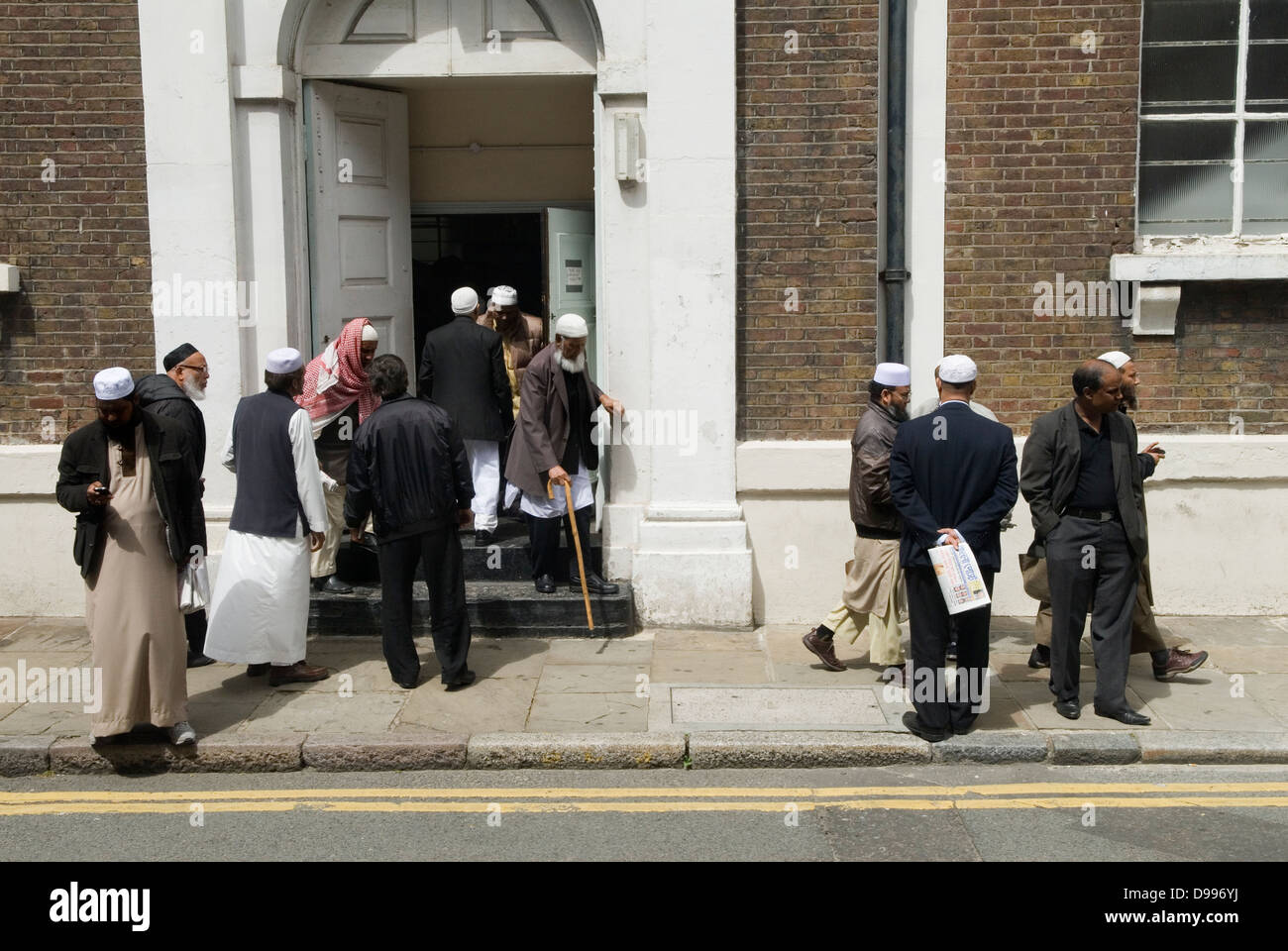Muslim men leaving Friday Prayers Jamme Masjid Mosque, Brick Lane ...