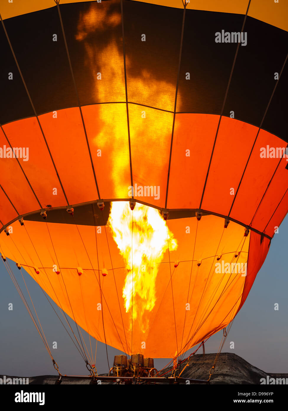 Burner directing a flame into the envelope of balloon Stock Photo - Alamy