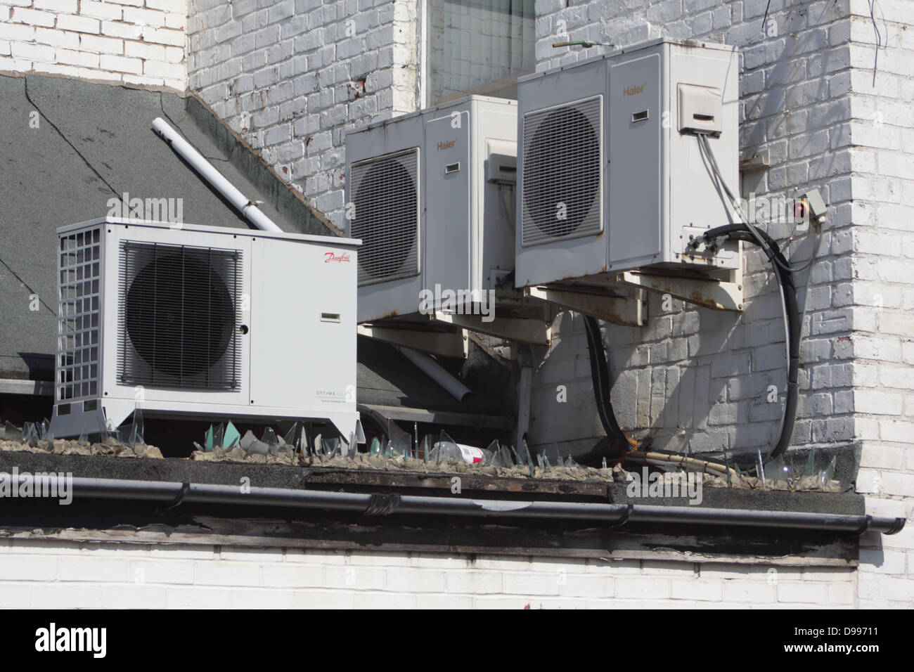 Air conditioning units mounted on wall Stock Photo - Alamy