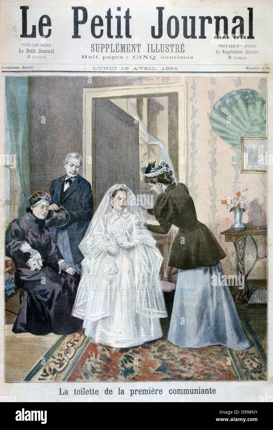Girl dressed for her first Communion. Mother adjusts the veil, while ...