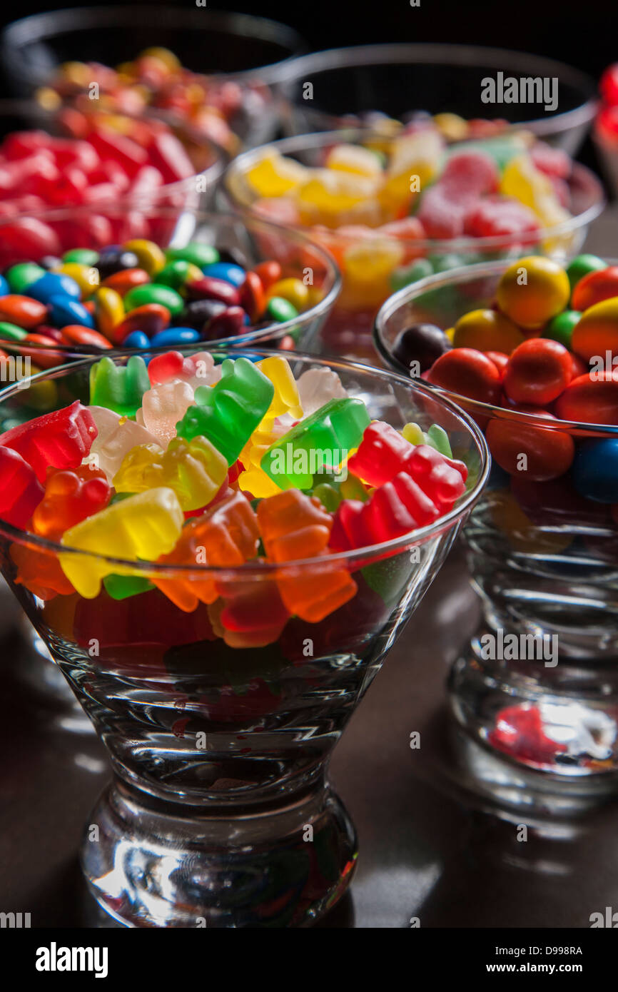 colorful mixed candies in small clear glass bowls Stock Photo - Alamy