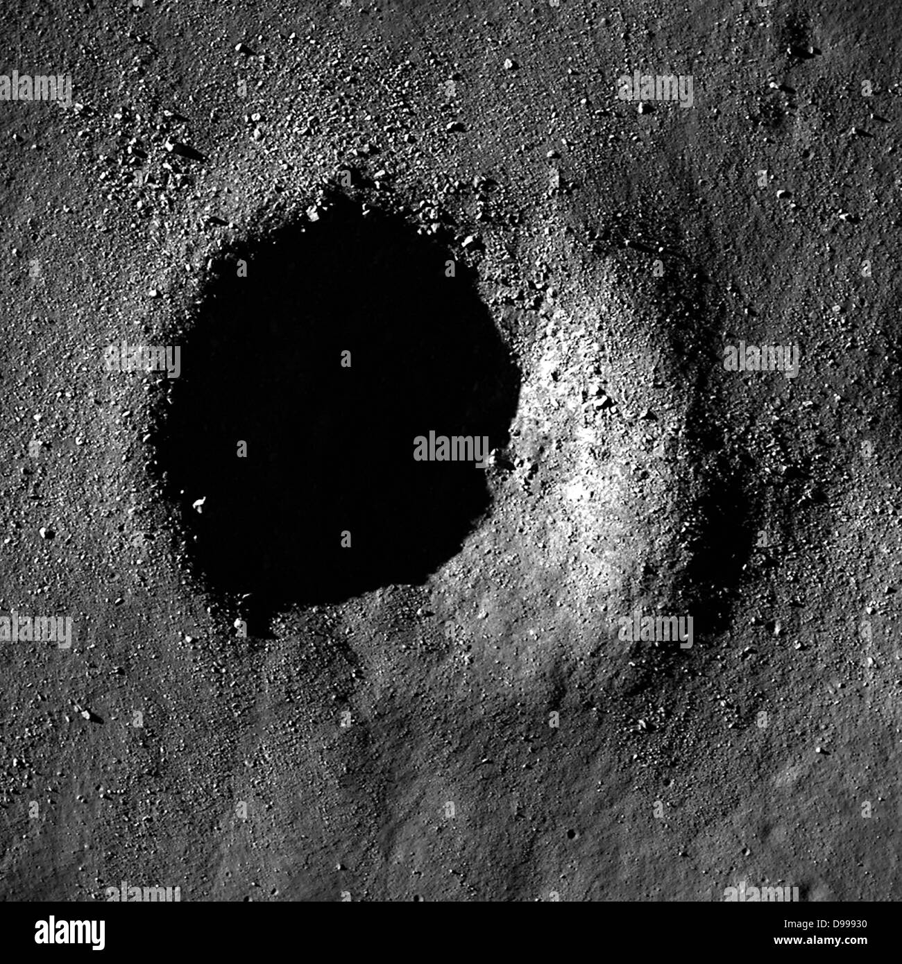 Low Sun image of a fresh crater in the lunar highlands. Boulders are ...