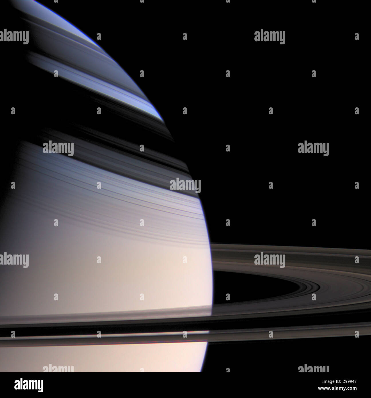 Saturn embraced by the shadows of its stately rings. Cassini Stock ...