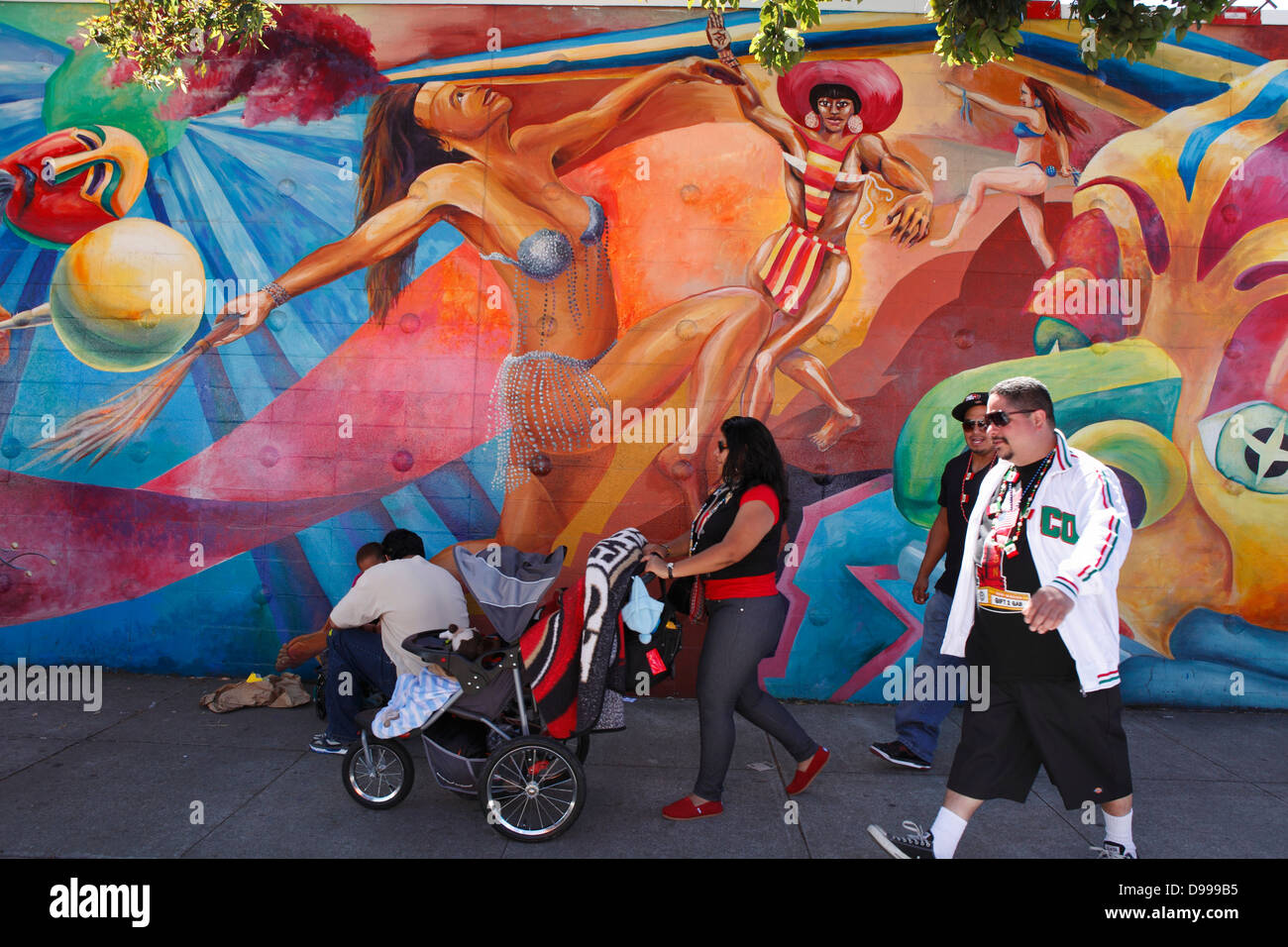 People walking in colorful Mission District, San Francisco, California ...