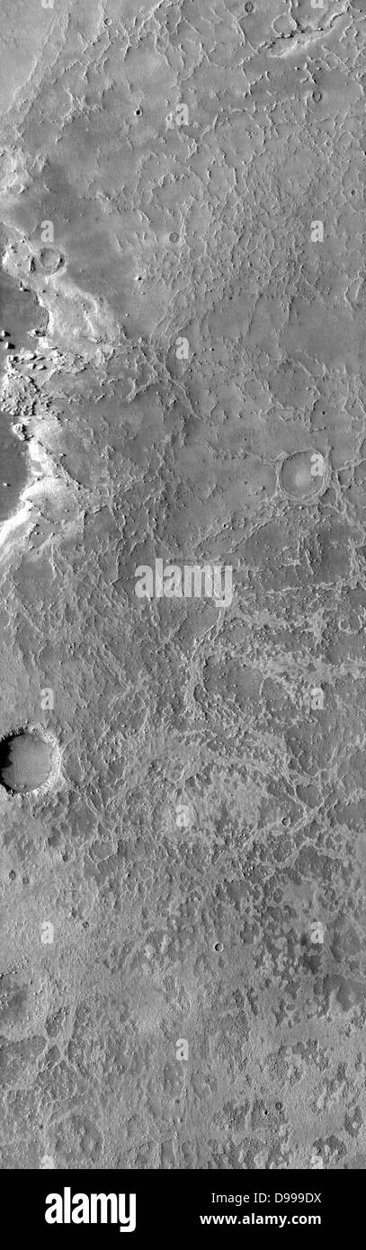 Eroded, or "etched" terrain dominates the field of view of this THEMIS ...