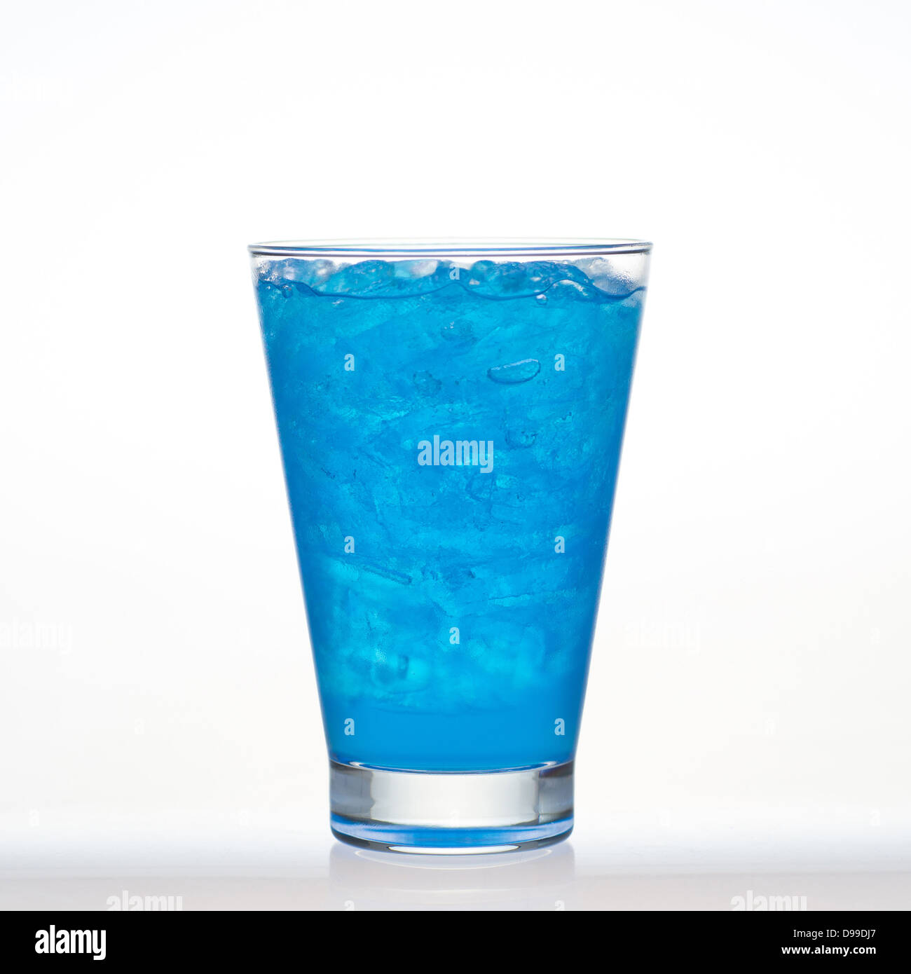 Blueberry flavor aerated drinks with ice in glass isolated on white ...