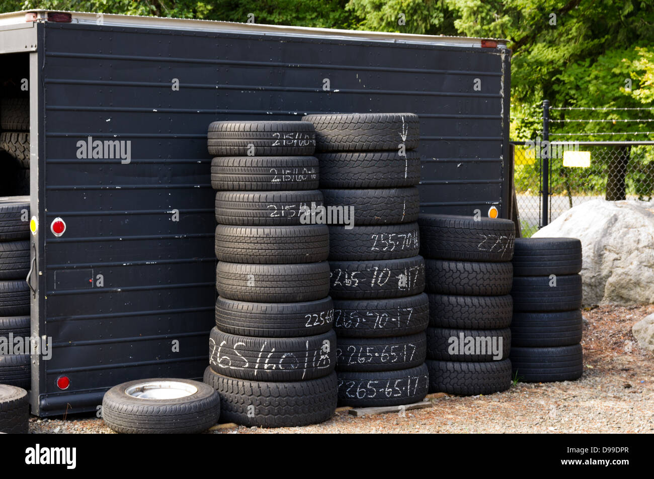 A stack of automobile tires ready for use Stock Photo - Alamy
