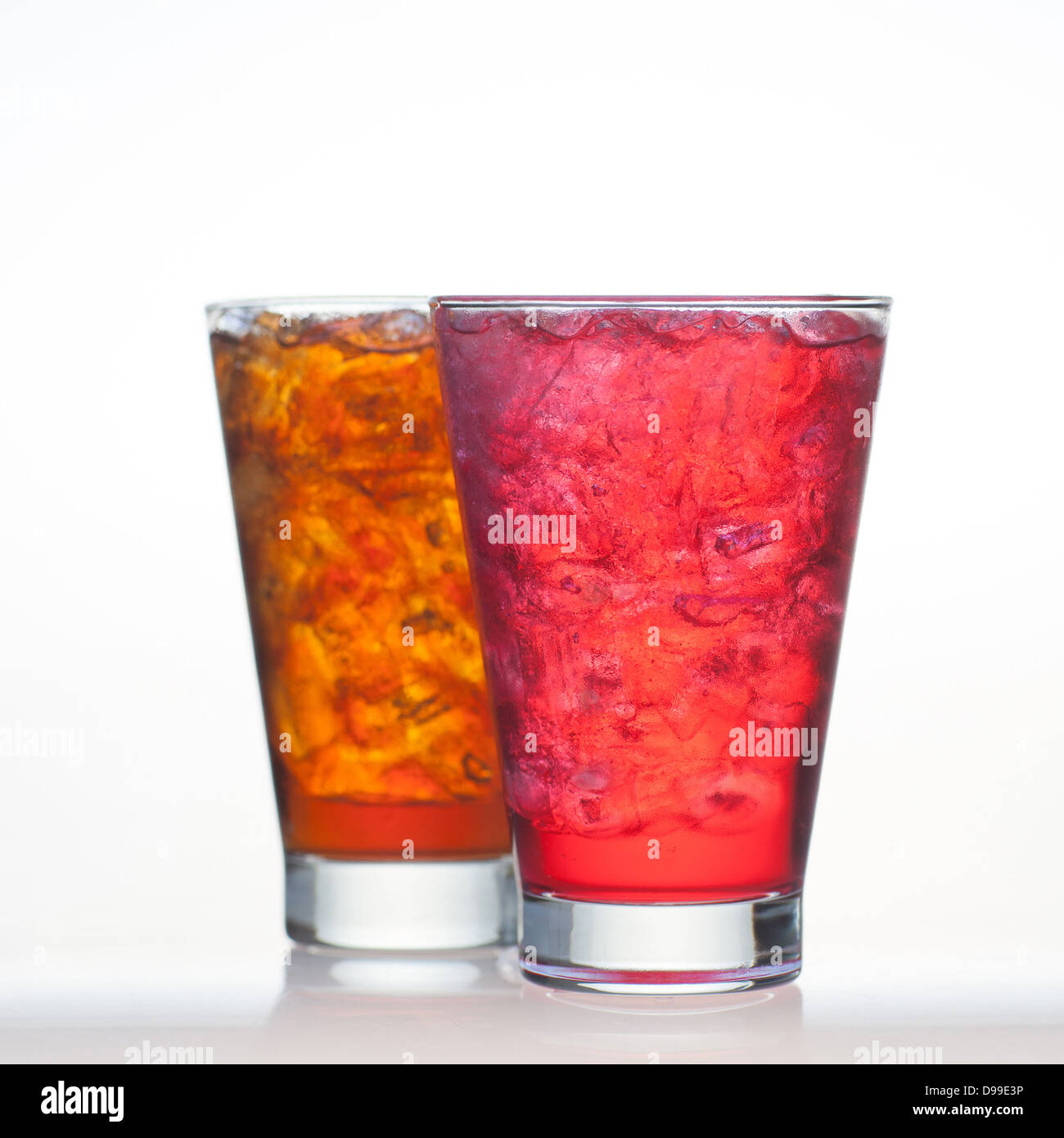 Red fruit and root beer flavor soft drinks whit soda water isolated on ...