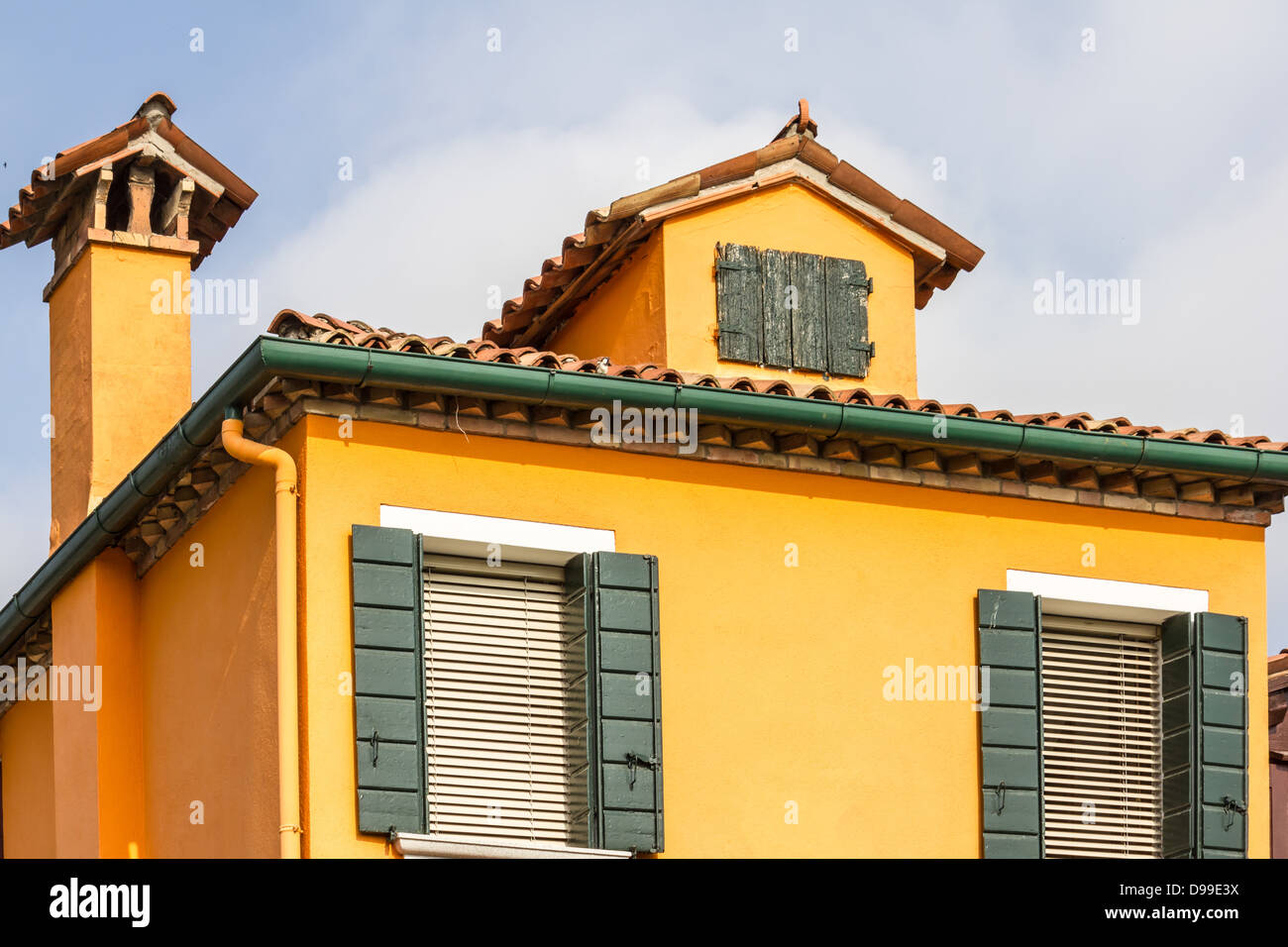 Tile roof and window shutters on home in Burano, Venice Italy Stock ...