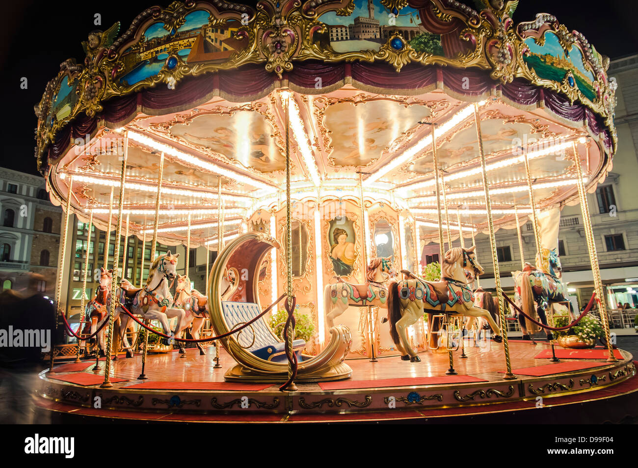 Carousel at night in Florence, Italy Stock Photo - Alamy