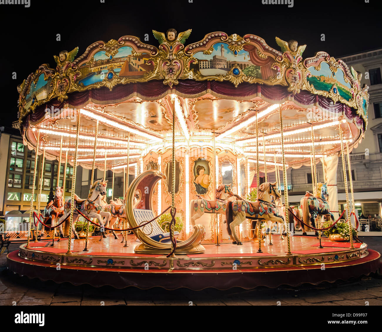 Carousel at night in Florence, Italy Stock Photo - Alamy