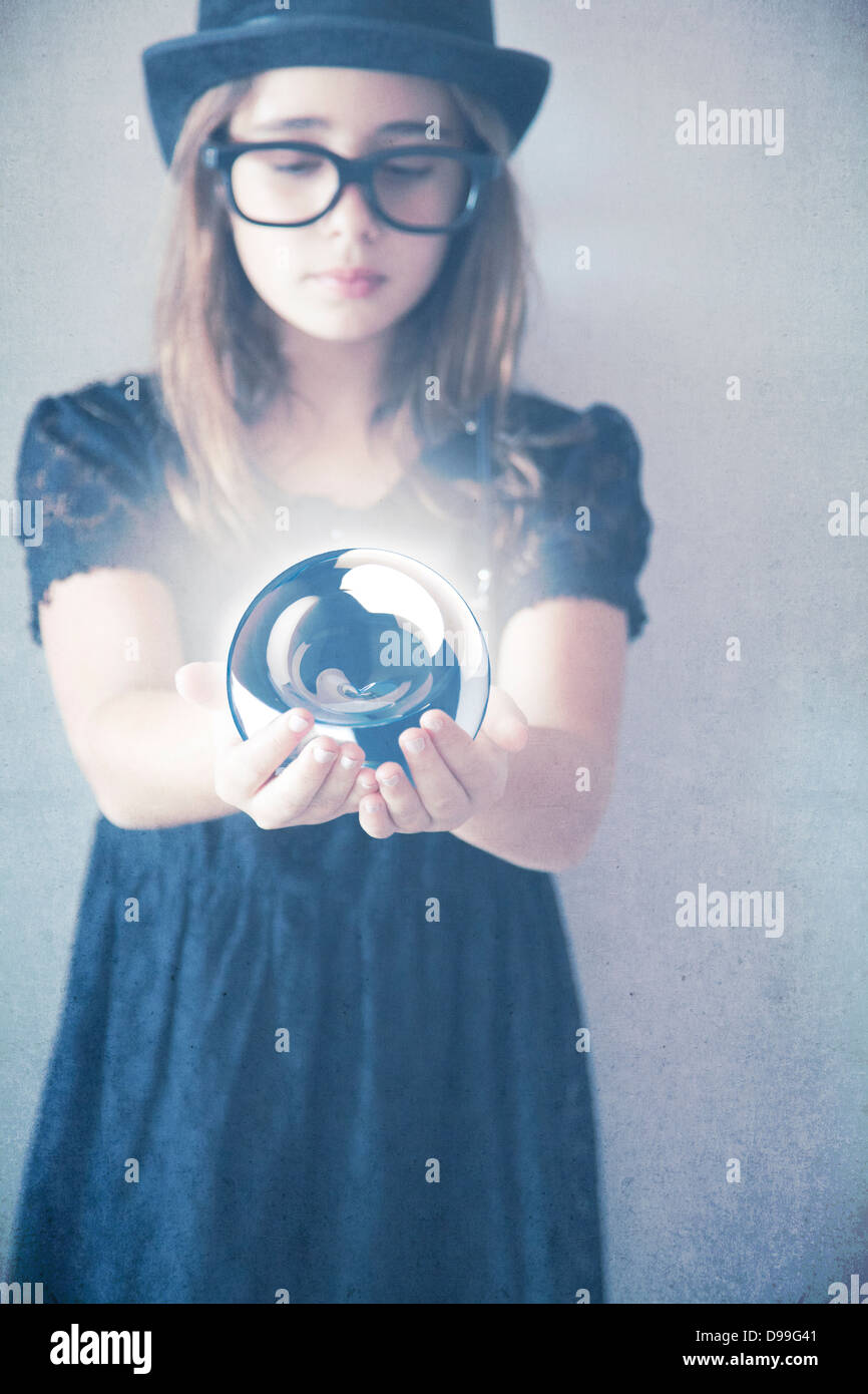 Girl Holding Magical Orb Stock Photo - Alamy
