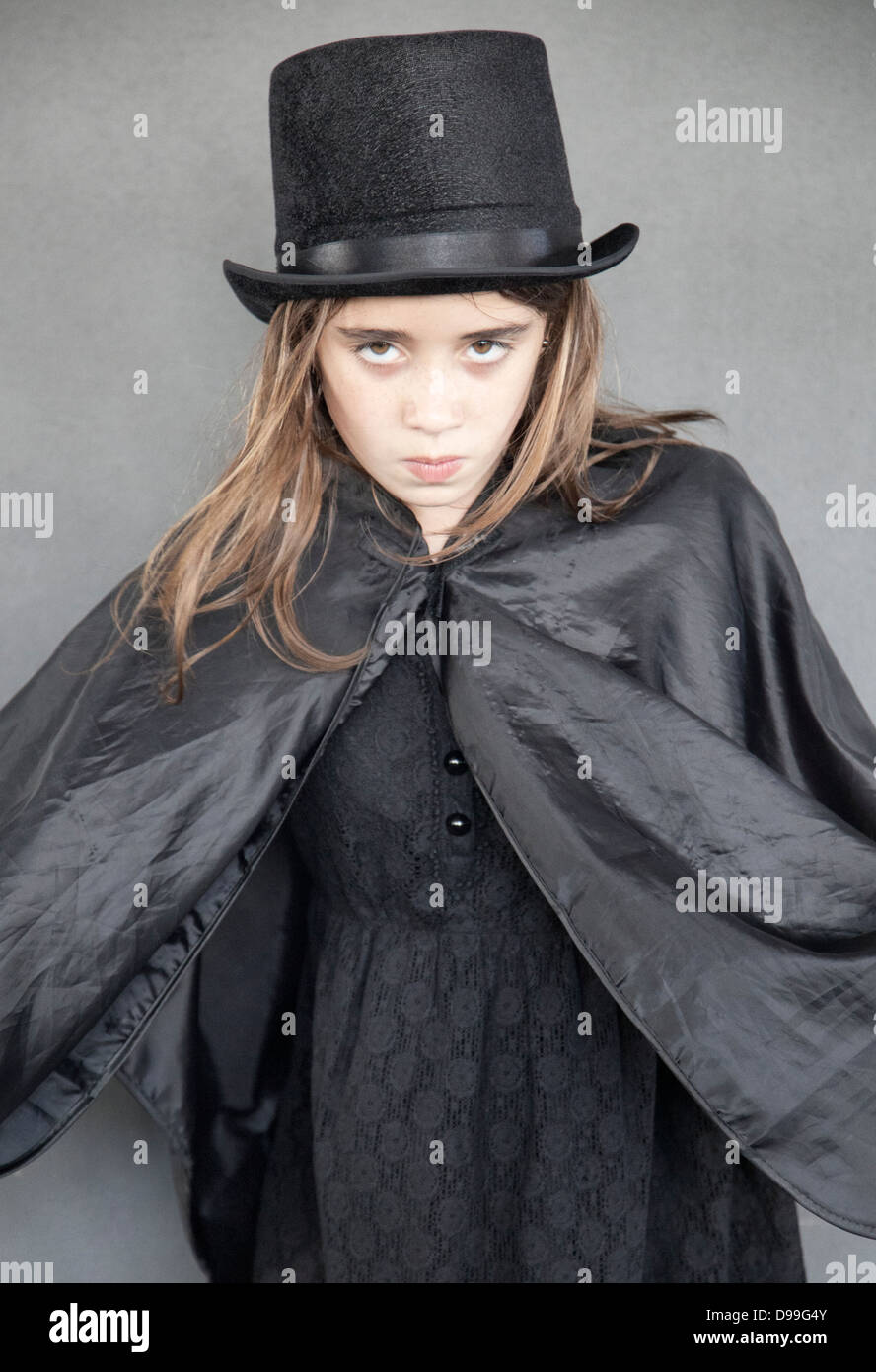 Bad Girl in Black with Top Hat Stock Photo - Alamy