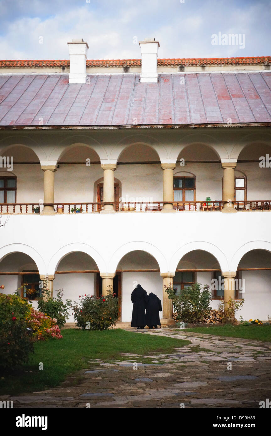 The courtyard of the Polovragi monastery in Romania Stock Photo - Alamy