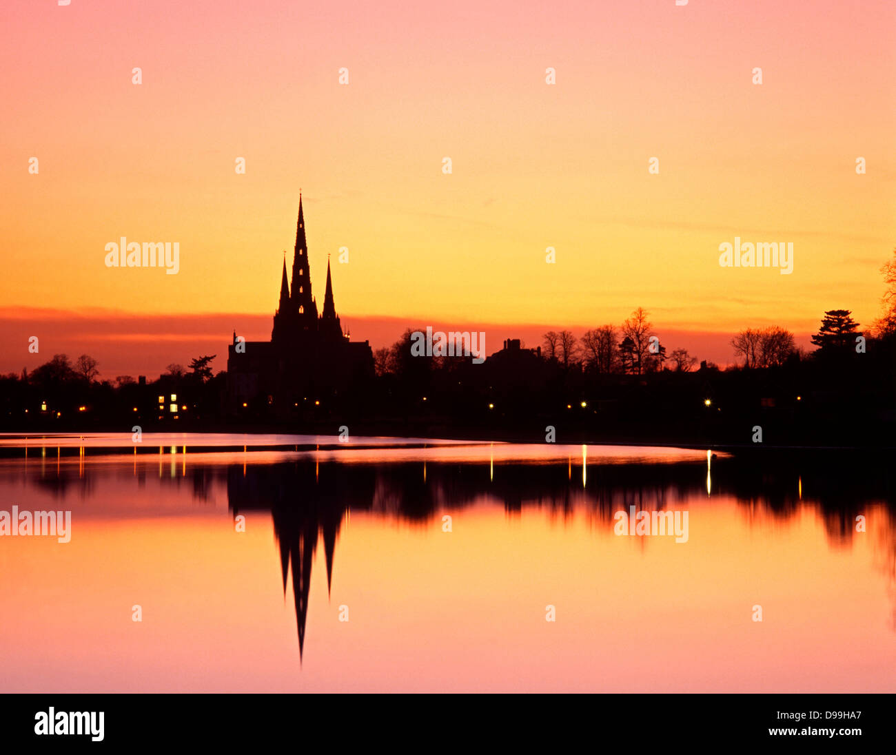 Stowe pool at sunset with the cathedral and it's reflection to rear ...