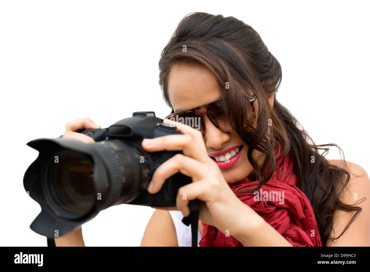 Female photographer taking a picture with camera Stock Photo - Alamy
