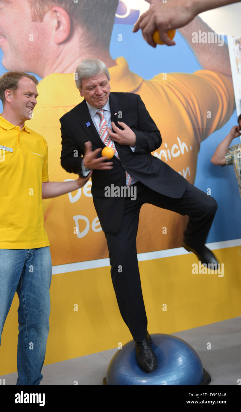 Premier of Hesse Volker Bouffier balances on a ball the Hesse State ...