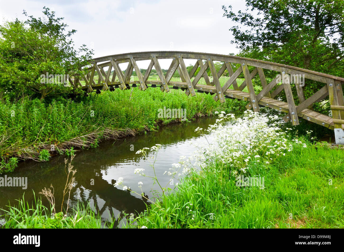 wooden footbridge over river Bure on the Weavers way path footpath ...