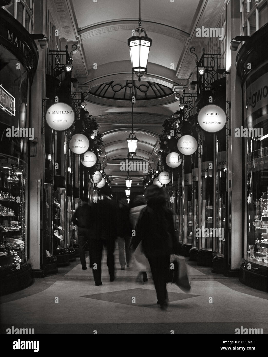 Evening shoppers in the Burlington Arcade, Mayfair, London, 1982 Stock ...