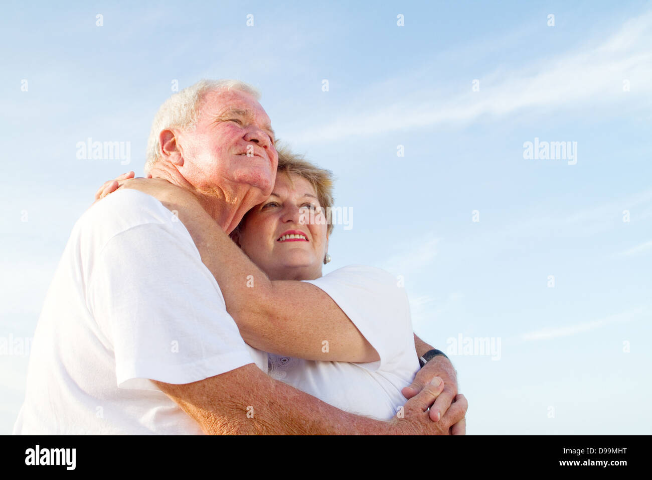 senior couple hugging Stock Photo - Alamy