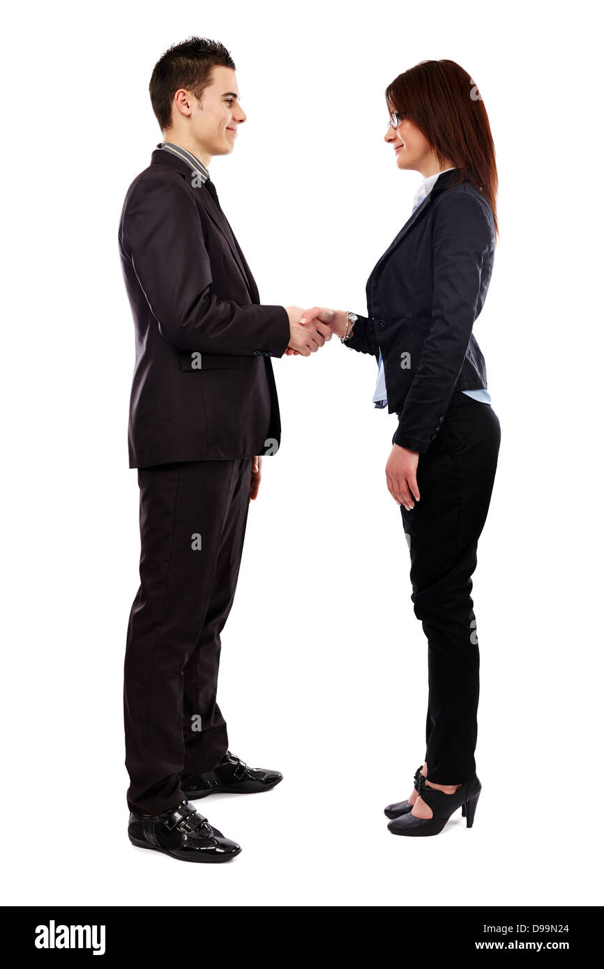 Full length pose of businespeople shaking hands. Isolated on white ...