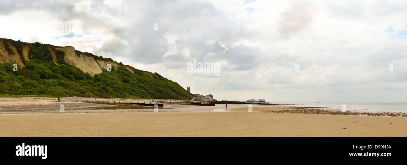 Cromer pier beach cliffs and town Stock Photo - Alamy