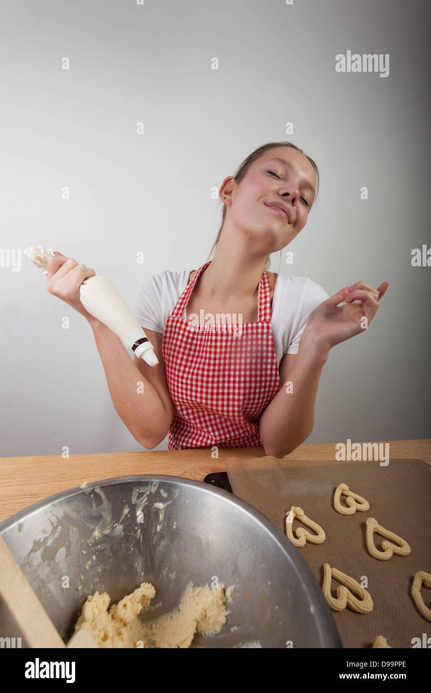 young woman baking cookies Stock Photo - Alamy