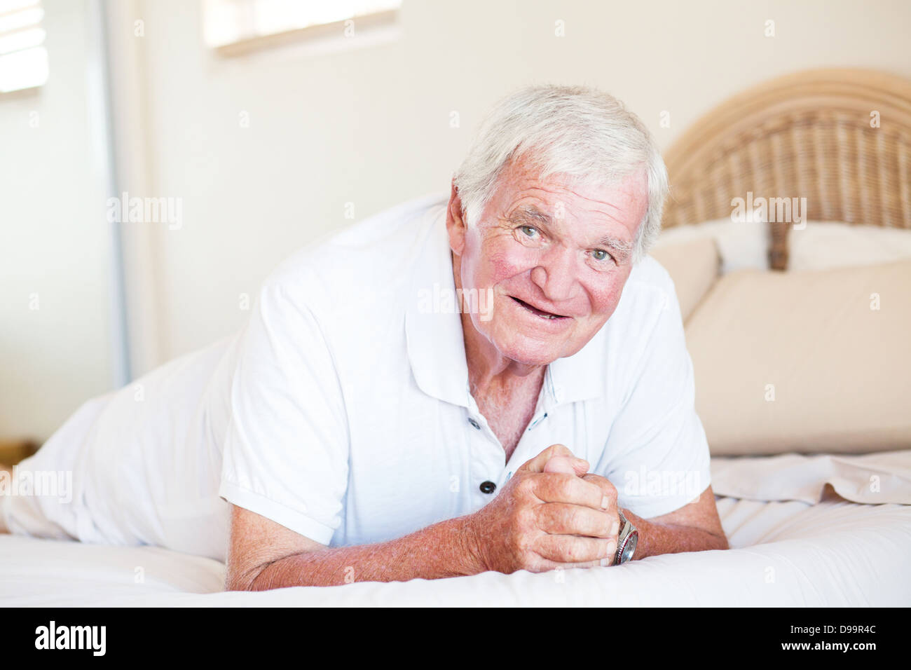 Elderly man alone happy bed hi-res stock photography and images - Alamy