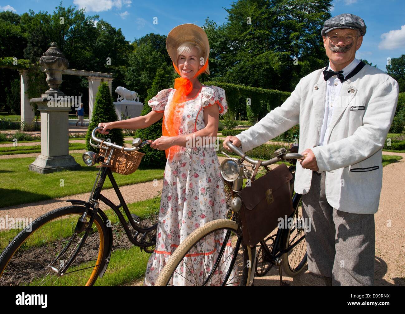Two people arrive at the German Rose Show at the Ostdeutsche ...