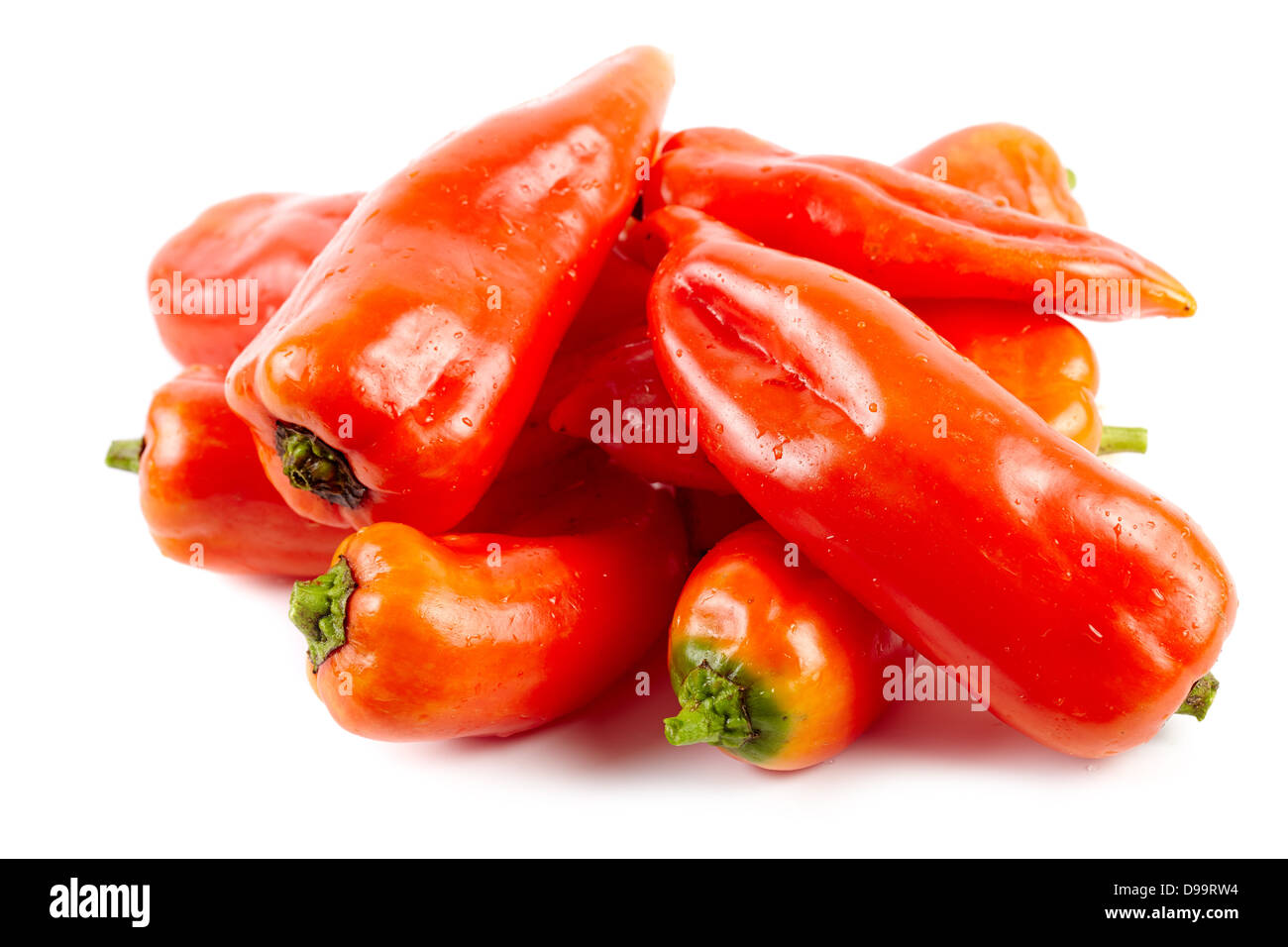 Pile of fresh raw red bell peppers isolated on white background Stock ...