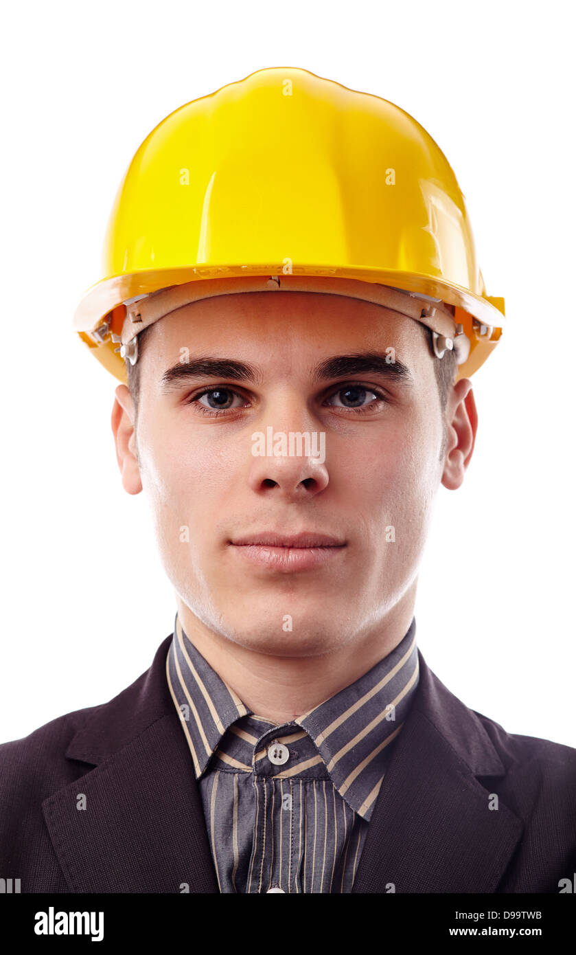 Closeup of young engineer in hard hat, isolated on white background ...