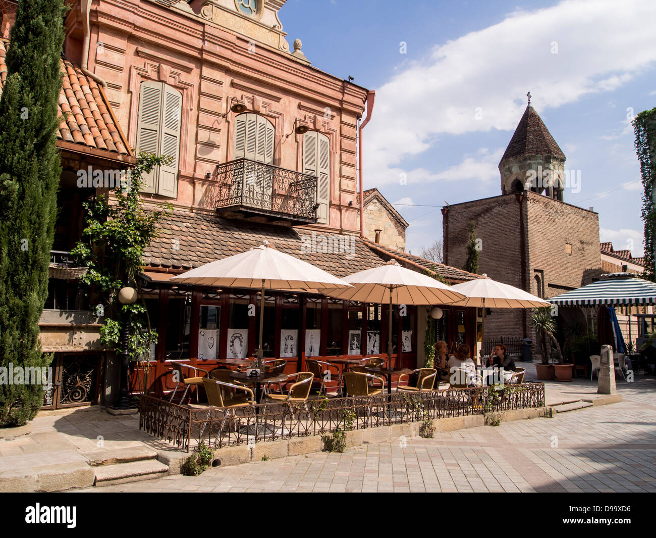 Cafe next to The Leaning Tower in the old town of Tbilisi Stock Photo ...