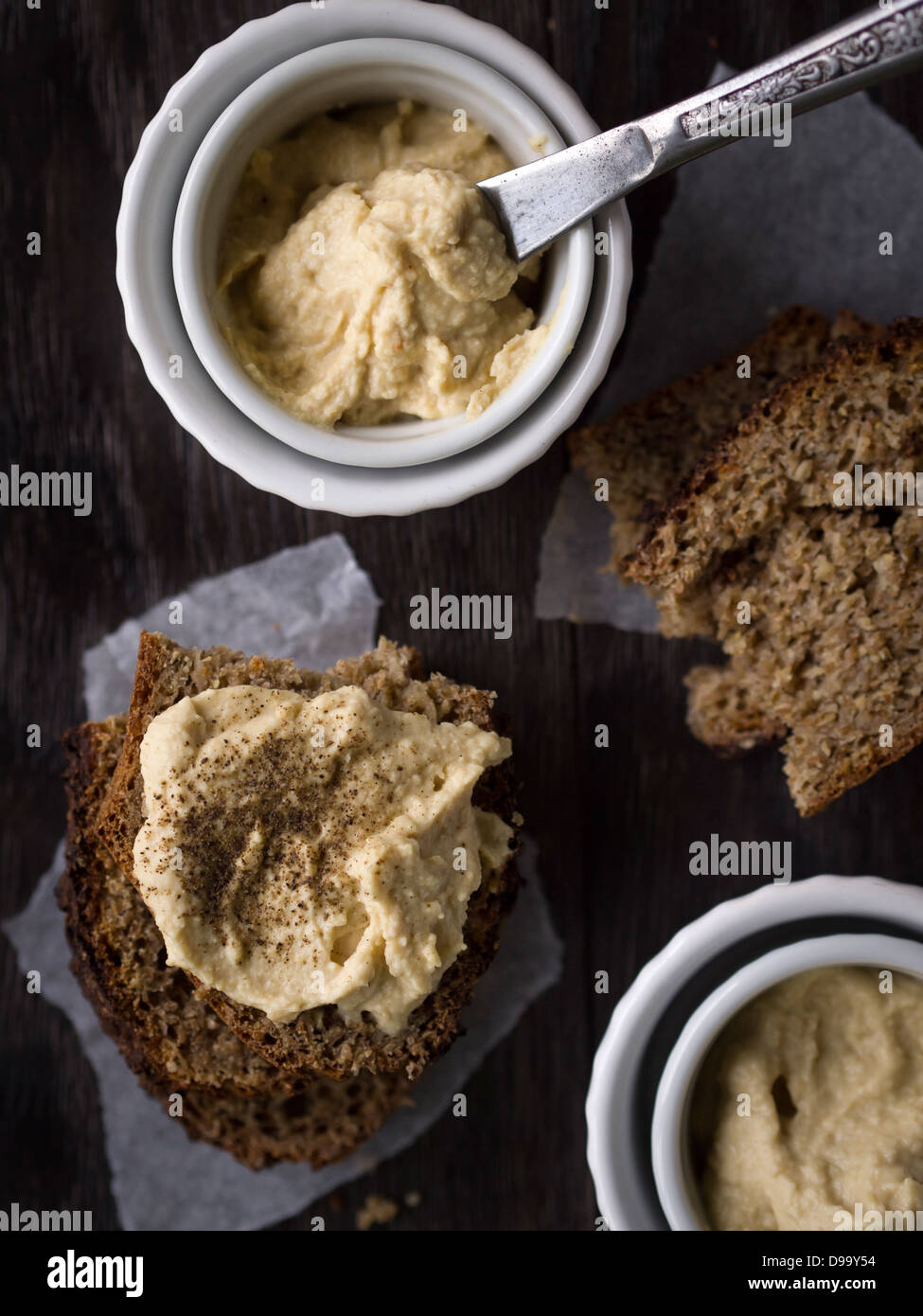 Traditional hummus with homemade whole grain bread Stock Photo - Alamy