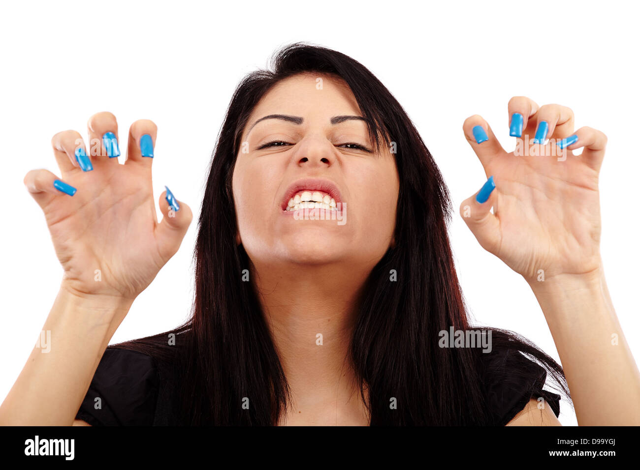 Very angry and frustrated young Latin woman threatening to scratch ...