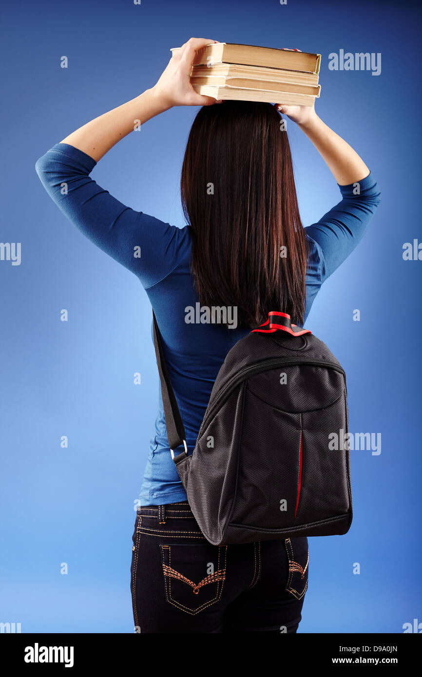 Woman balancing books head hi-res stock photography and images - Alamy