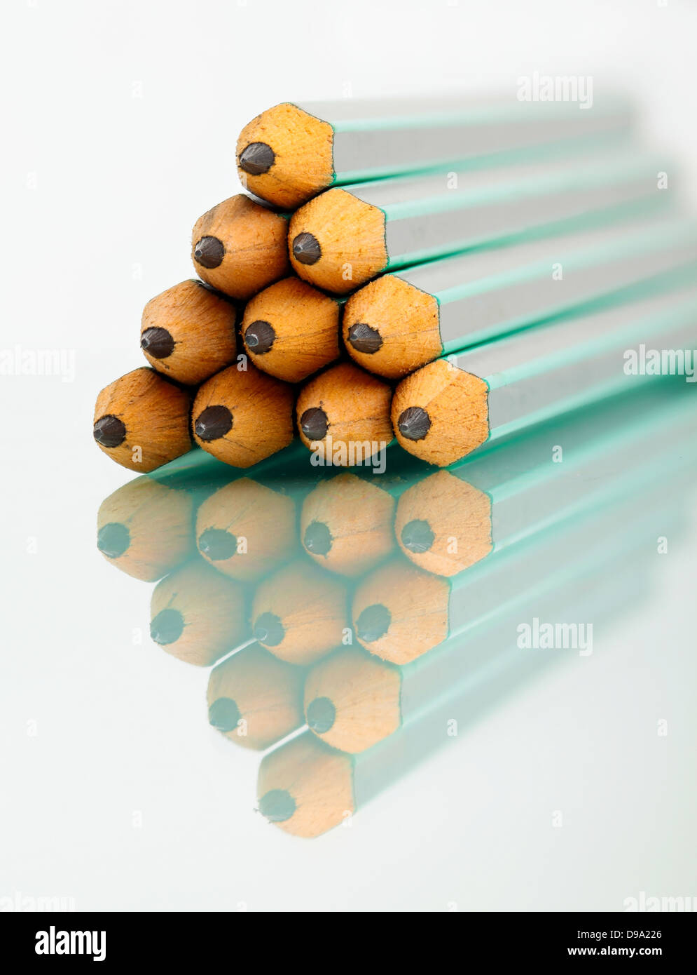 Pencil stack on isolation and reflection Stock Photo - Alamy
