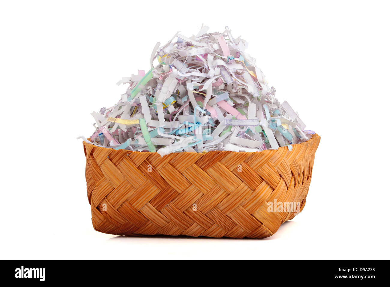 Shredded paper in bamboo busket. Concept of environmental recycle Stock ...