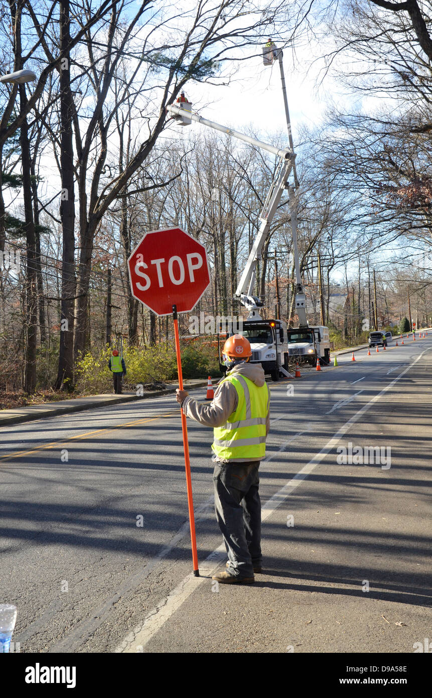 Worker holding stop sign hi-res stock photography and images - Alamy