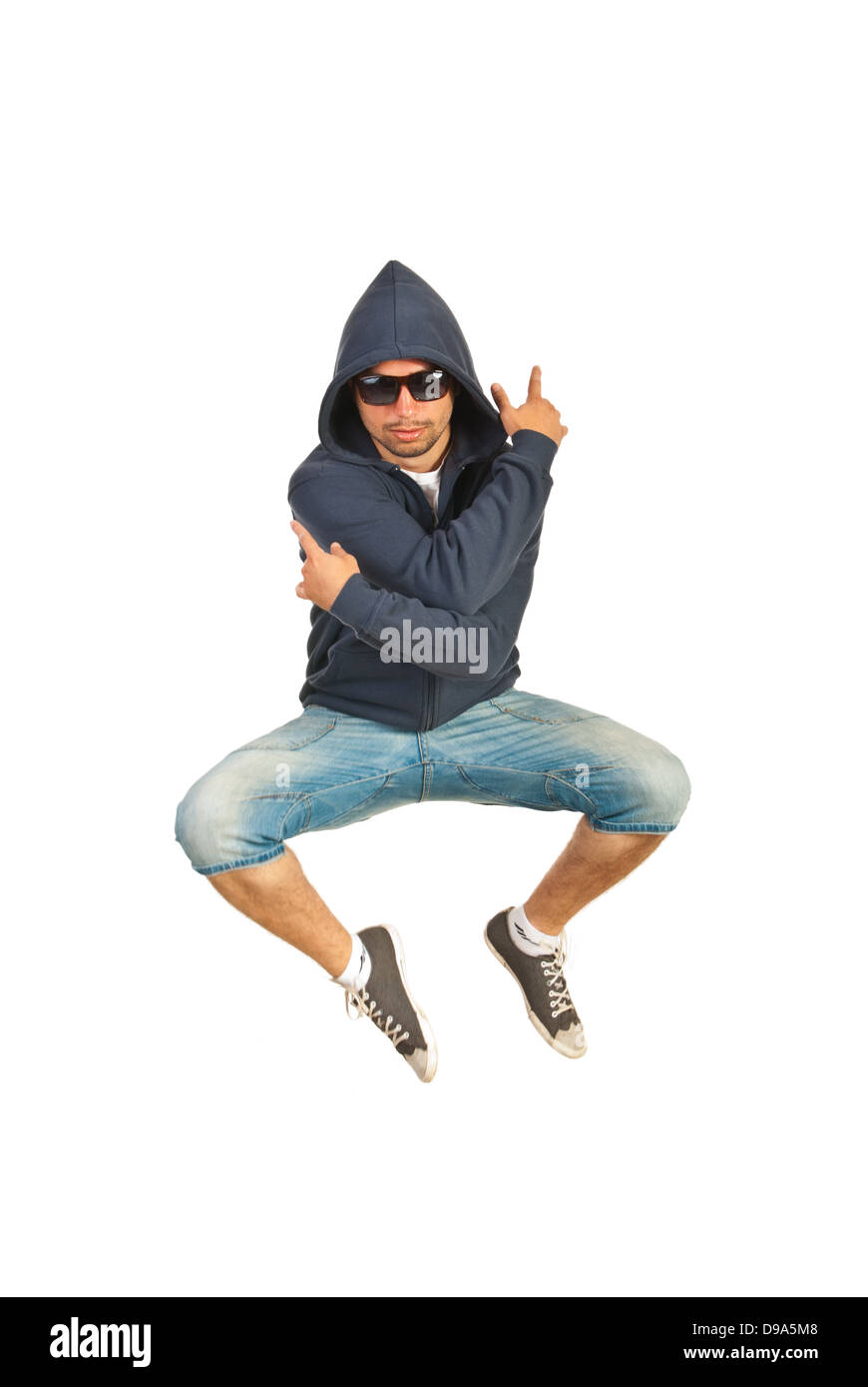 Rapper man jumping isolated on white background Stock Photo - Alamy