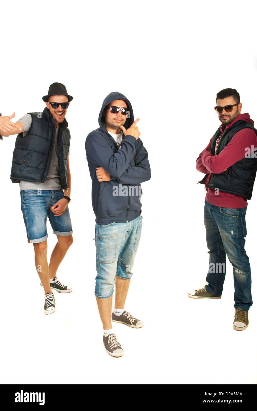 Group of three hip hop dancers standing in different dance position ...