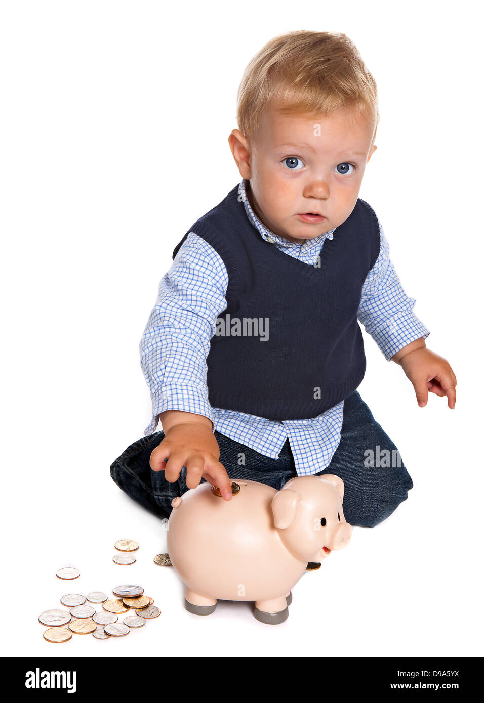 Little toddler boy playing with money and his piggy bank Stock Photo ...