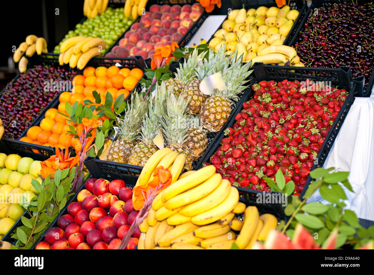 fruits and berries on display at the market Stock Photo - Alamy