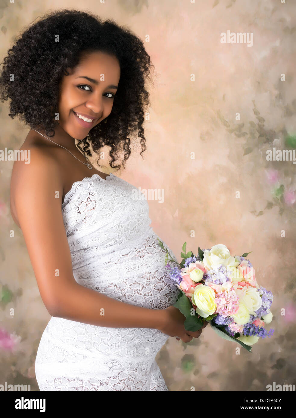 Portrait of a pregnant african woman with bridal flowers Stock Photo ...